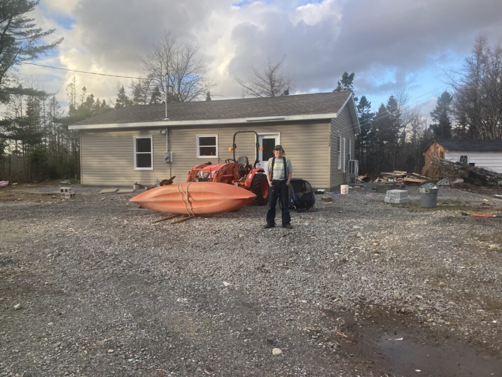 Dwayne Stewart in front of his new MDS house after his temporary ...